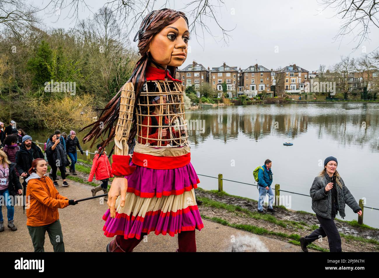 London, UK. 1st Apr, 2023. Little Amal leads a Sponsored Walk through ...