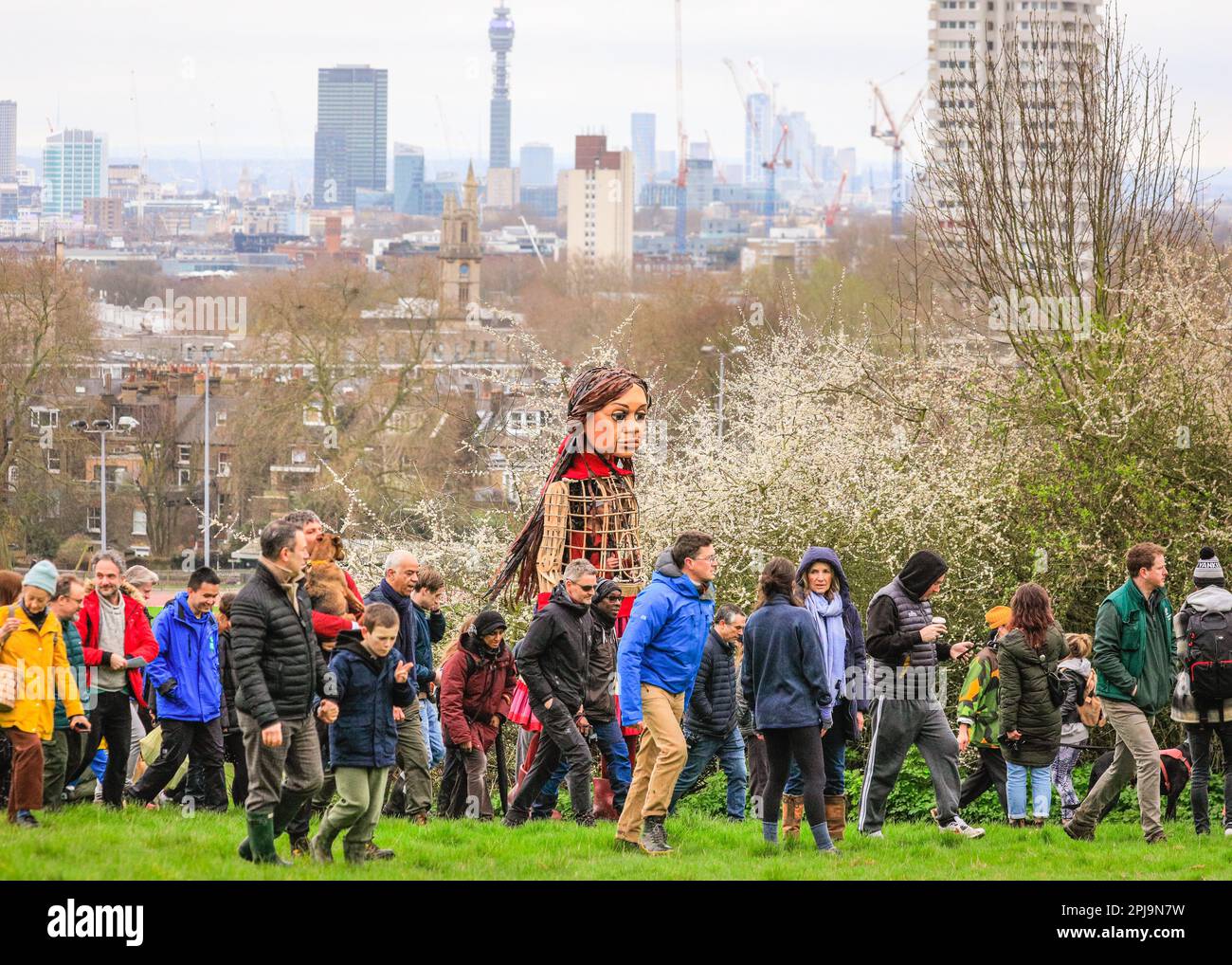 London, UK. 01st Apr, 2023. Little Amal walks up Parliament Hill ...