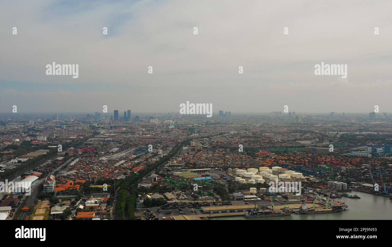 Aerial cityscape densely built asian city, seaport. urban environment ...