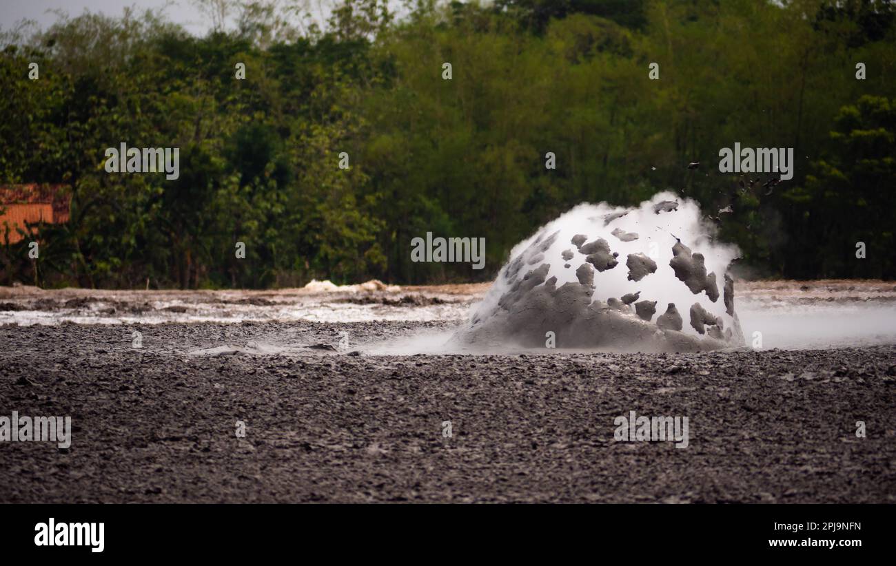 mud volcano with bursting bubble bledug kuwu. volcanic plateau with ...