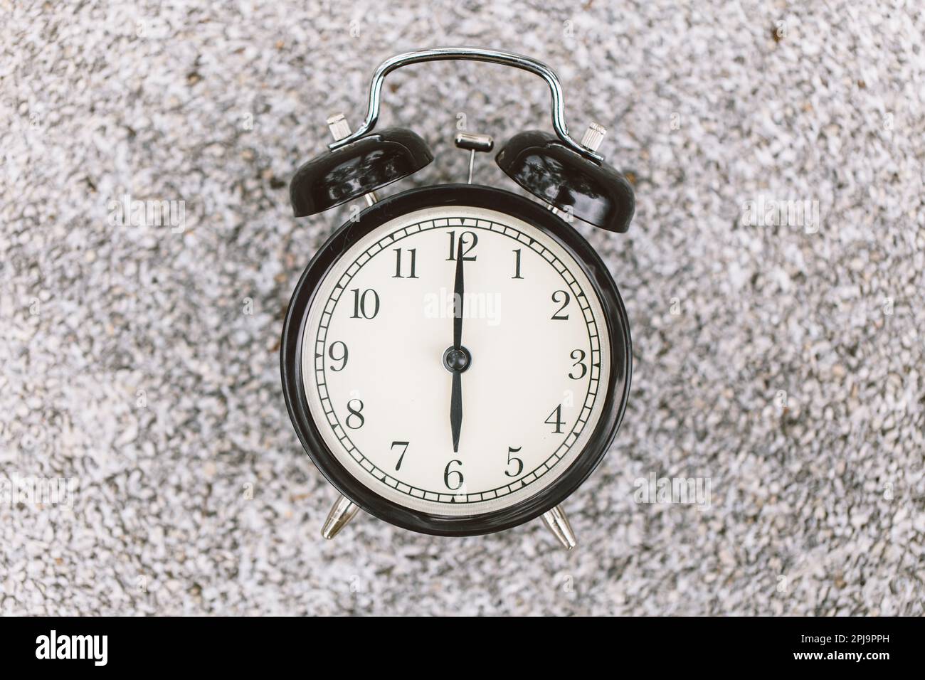 Closeup Retro Bell Clock on show time 6 o'clock focus on center object ...