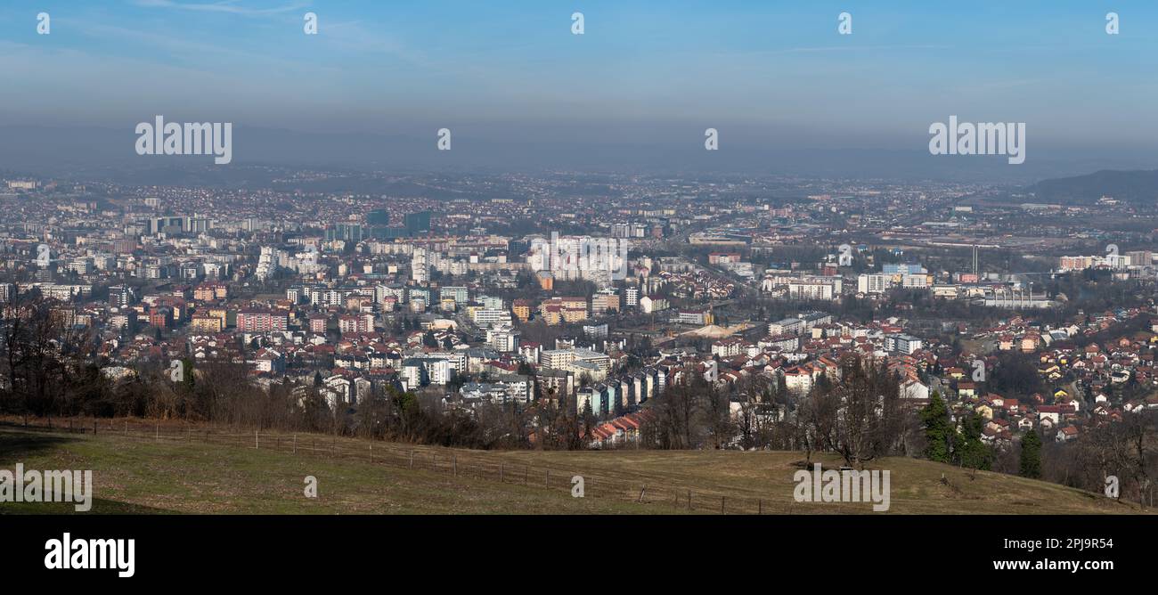 Panoramic view of Banja Luka city, distant hills fade in haze, air ...