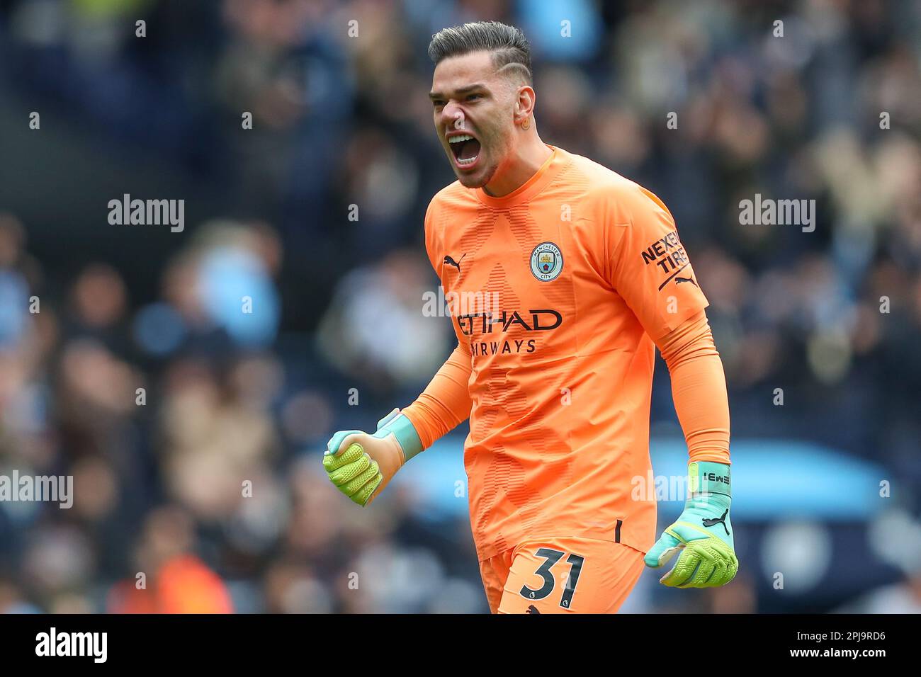 Ederson #31 of Manchester City celebrates Kevin De Bruyne #17 of ...