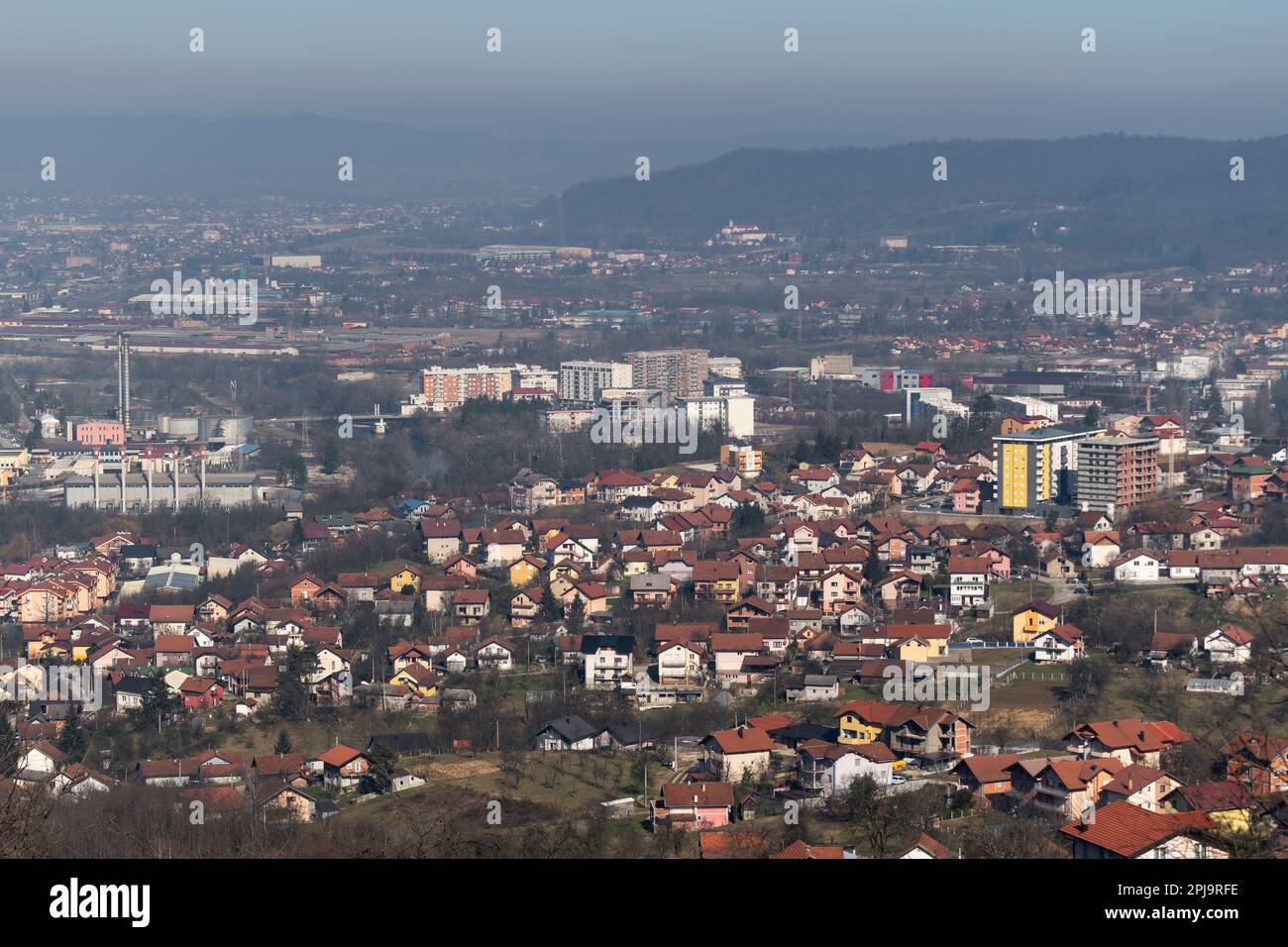 Cityscape of Banja Luka during sunny day, distant hill fade in hazy ...