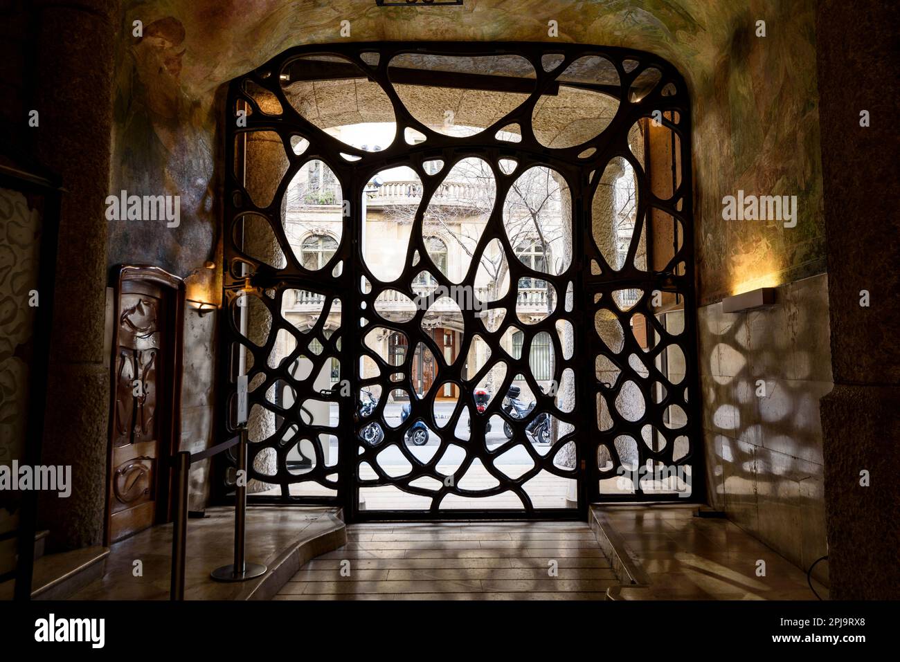 Wrought iron gate at the entrance of Casa Milà (La Pedrera) designed by ...