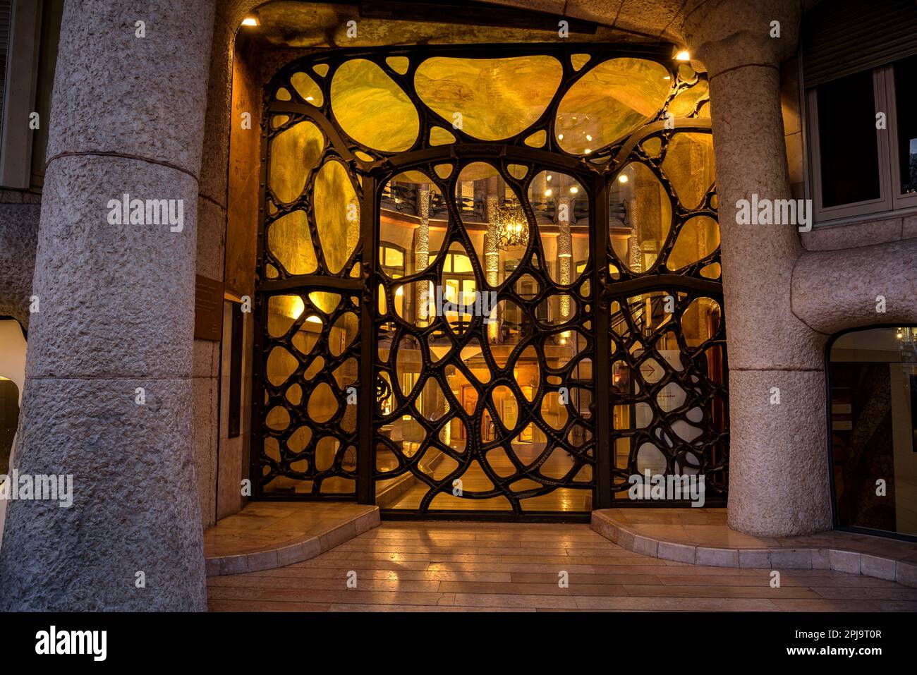 Wrought iron gate at the entrance of Casa Milà (La Pedrera) designed by ...