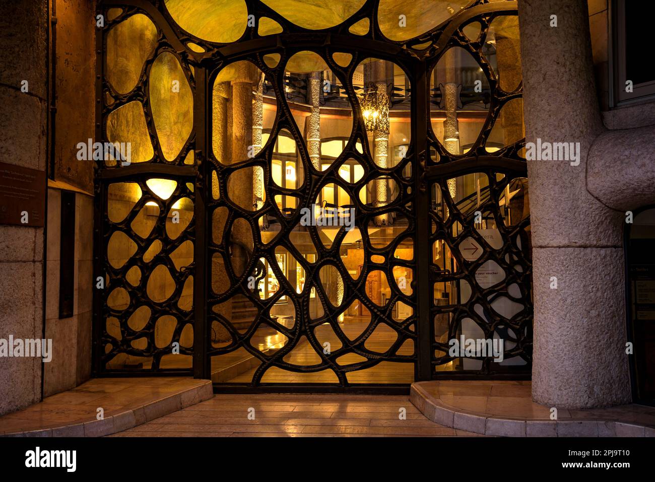Wrought iron gate at the entrance of Casa Milà (La Pedrera) designed by ...