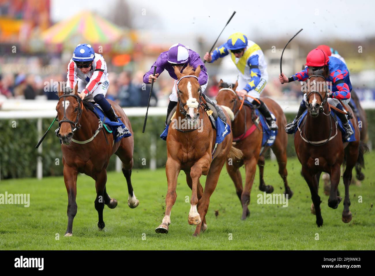 Doddie's Impact (left) ridden by jockey Billy Loughnane on their way to ...