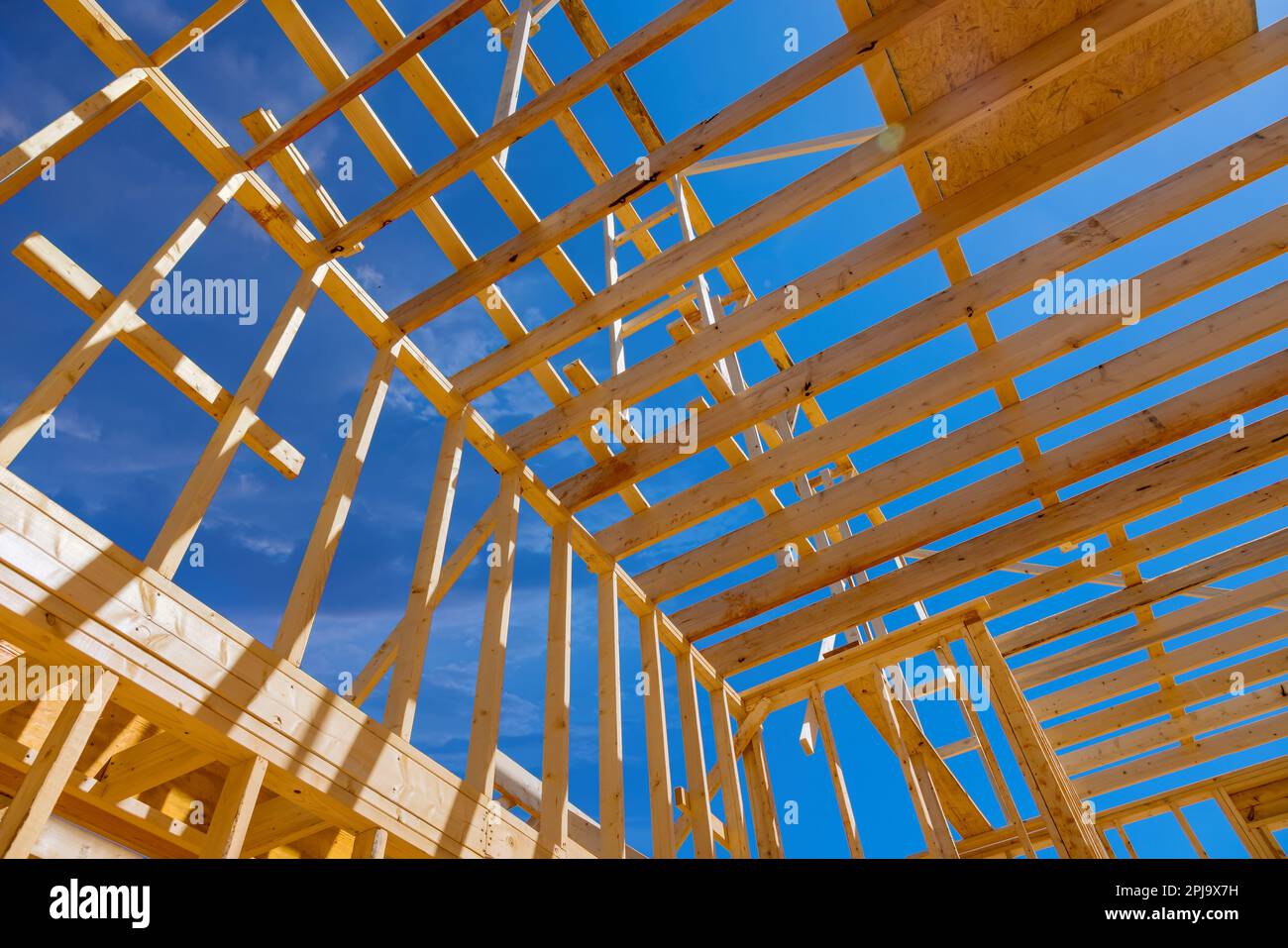 Using an existing framework trusses frame wooden roof beam to support ...