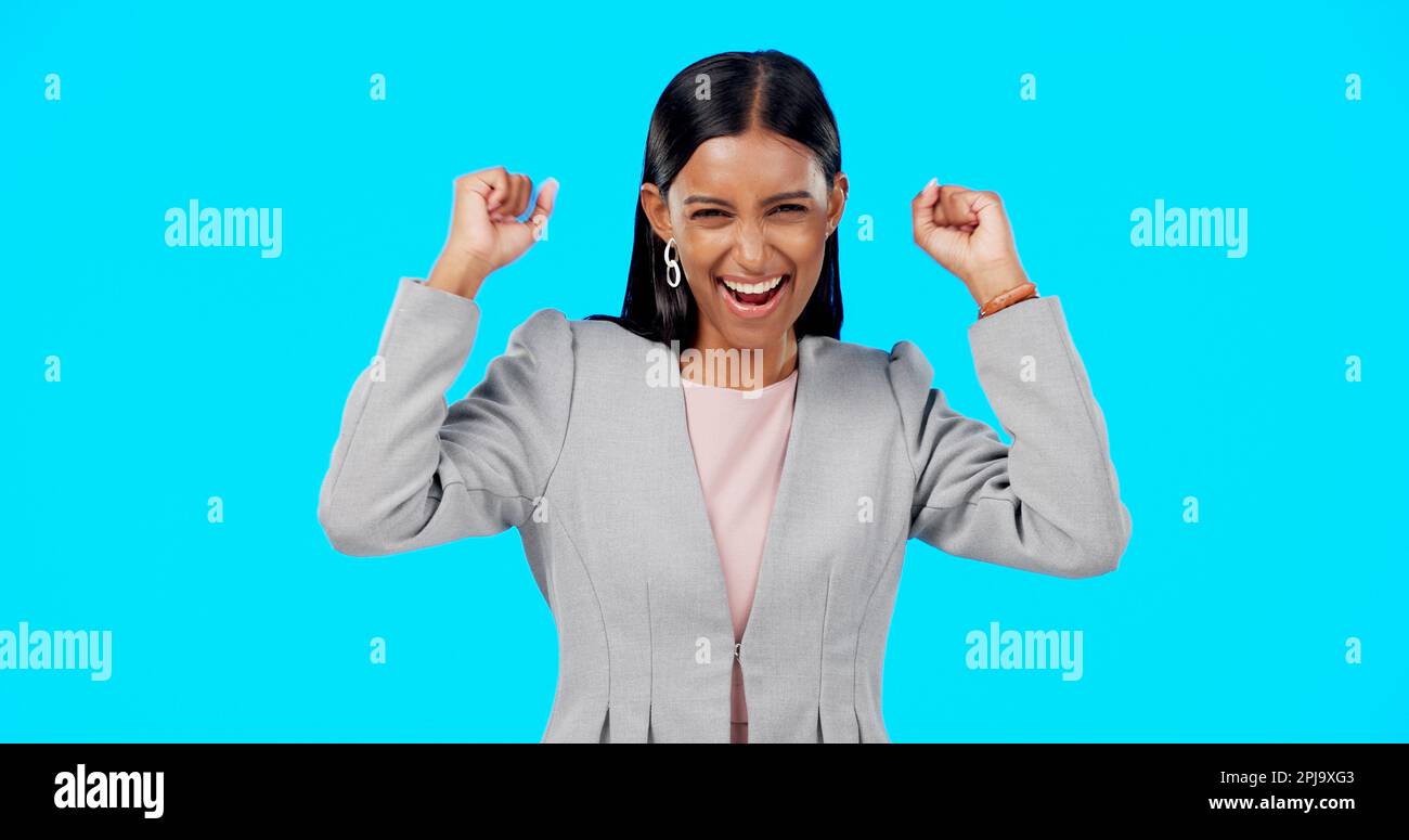 Yes, winning and woman cheers isolated on blue background celebration ...
