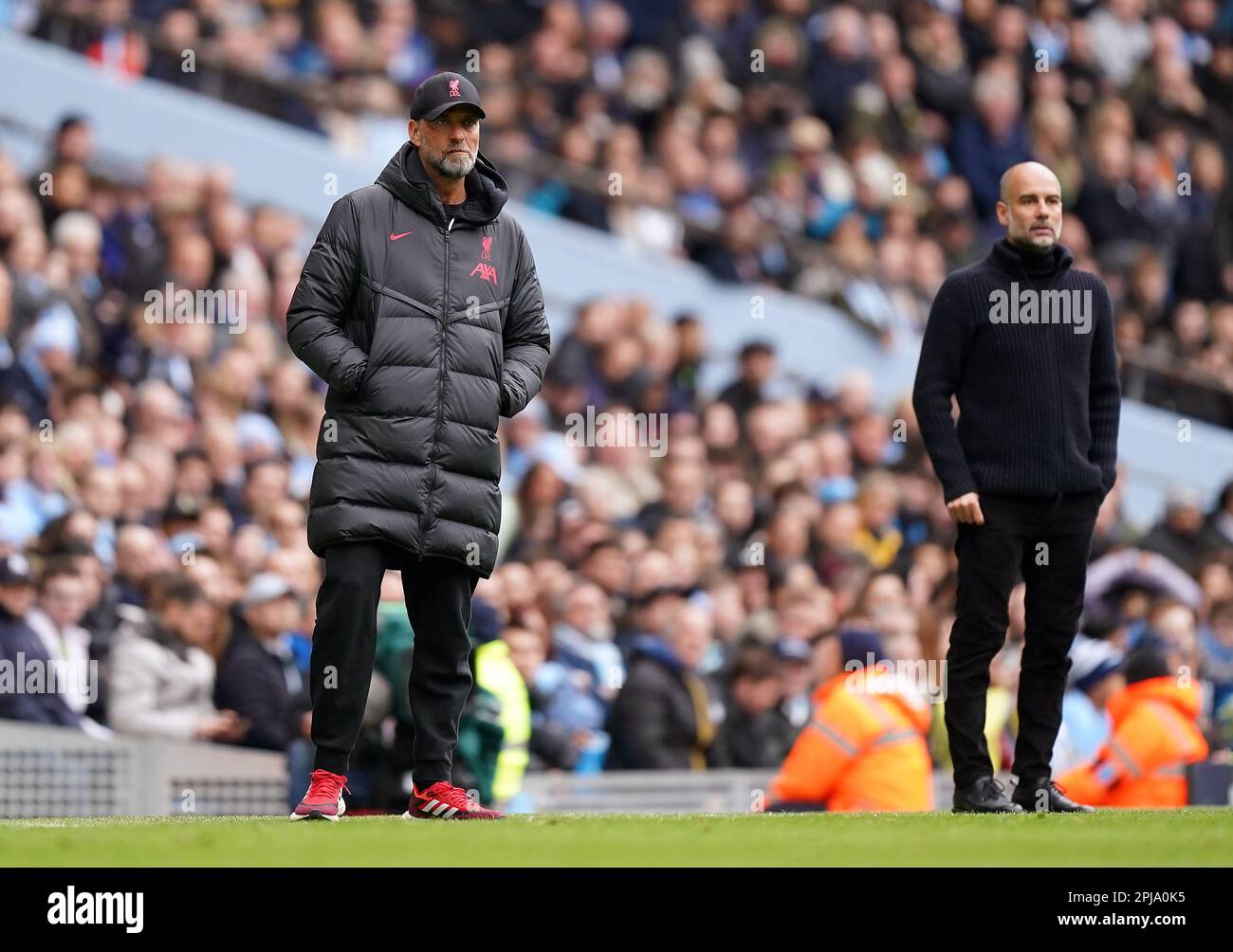 Liverpool manager Jurgen Klopp (left) and Manchester City manager Pep ...