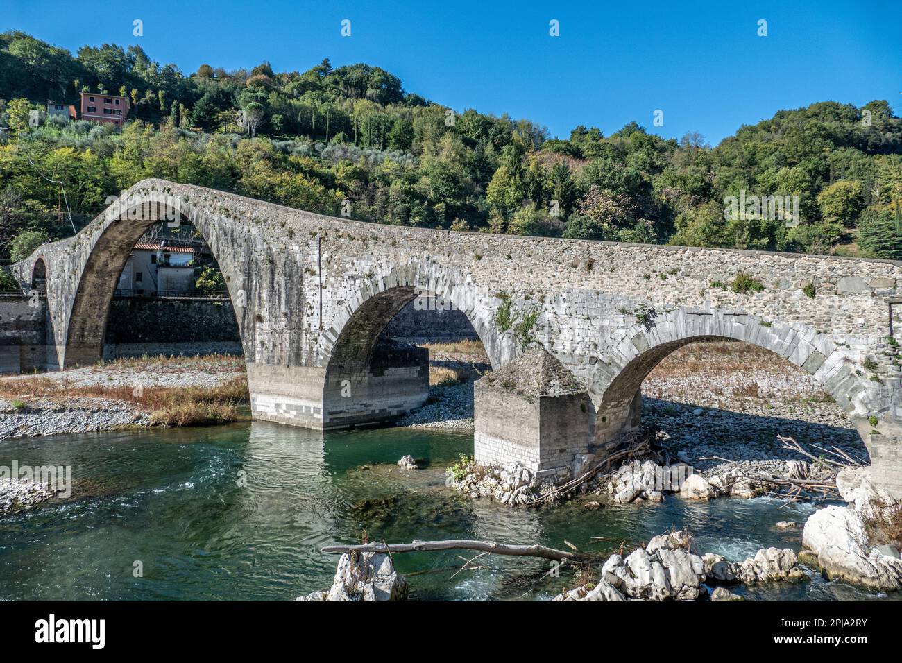Ancient stone bridge, the medieval Ponte Maddalena, or Devils Bridge ...
