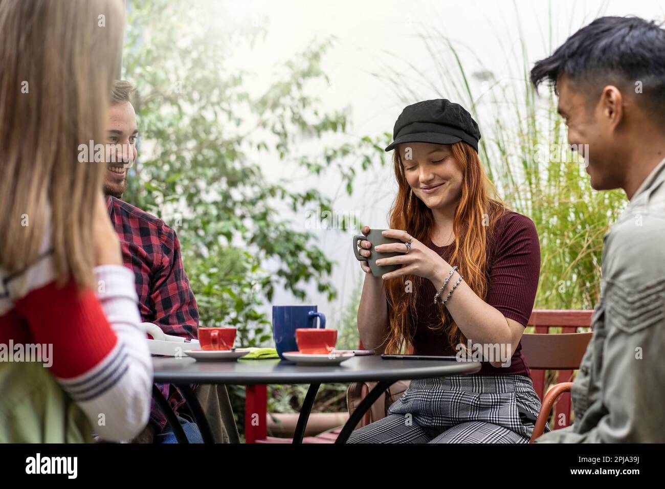 People group drinking latte at coffee bar garden - Happy friends ...