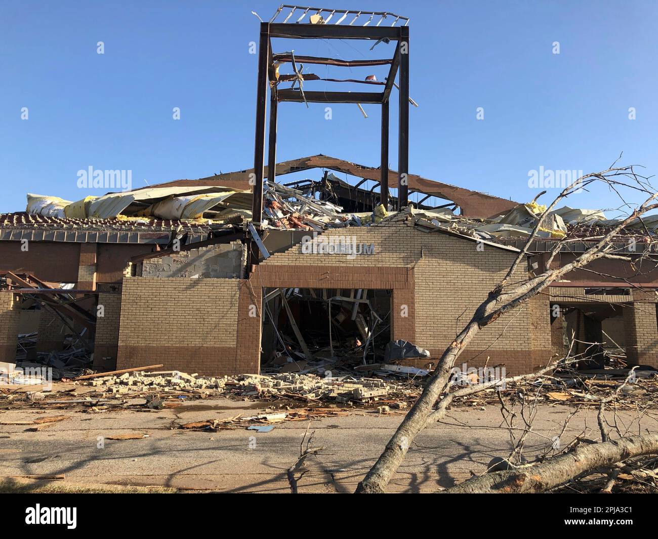 Debris covers the ground around Wynne High school in Wynne, Ark., on ...