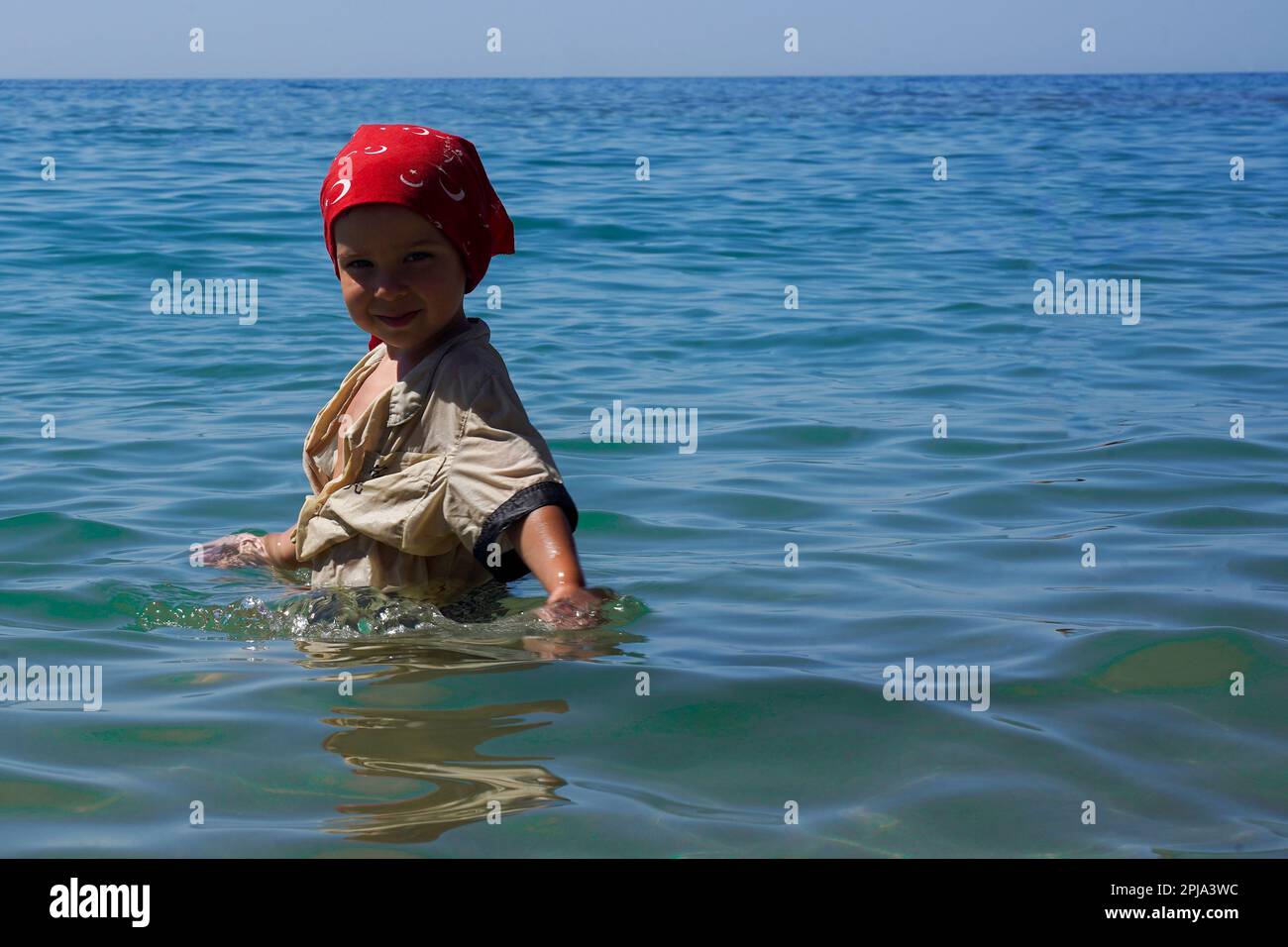 Kid tanning hi-res stock photography and images - Alamy