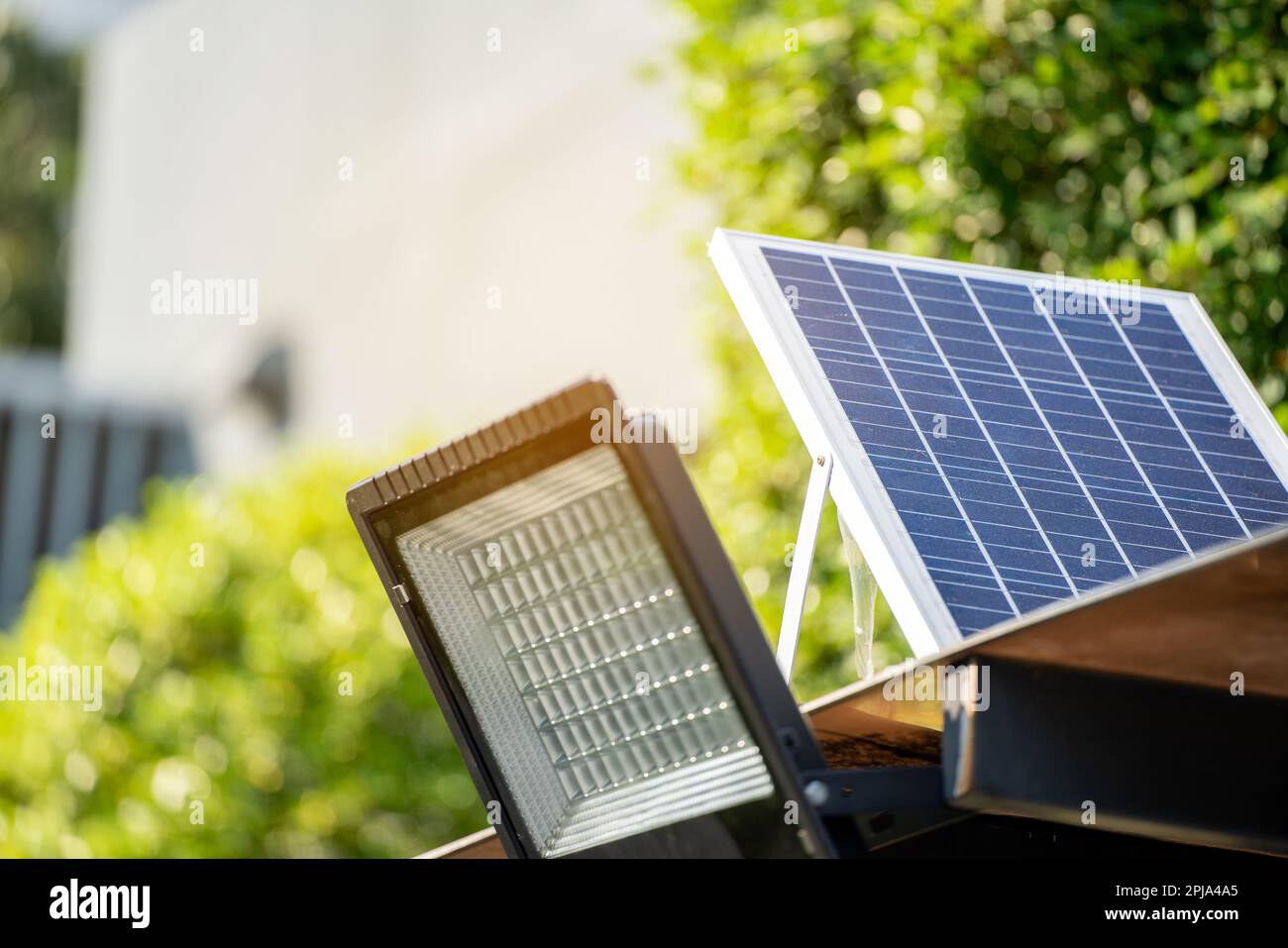 Solar Light. Public city light with solar panel powered on blue sky ...
