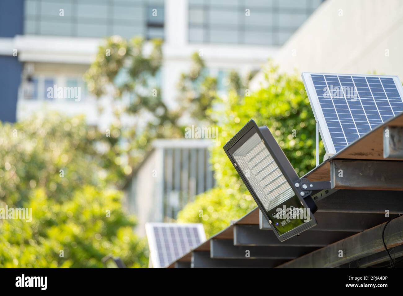 Solar Light. Public city light with solar panel powered on blue sky ...