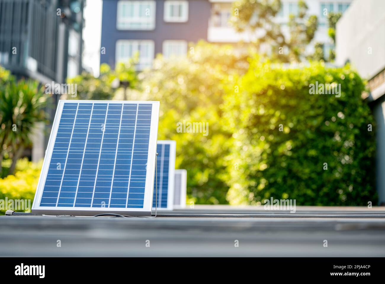 Solar Light. Public city light with solar panel powered on blue sky ...