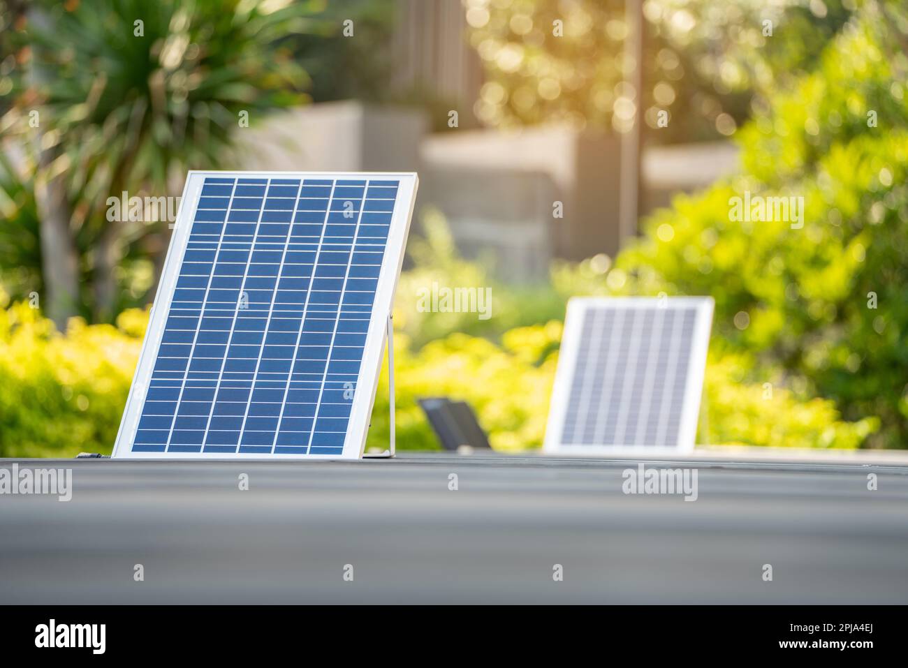 Solar Light. Public city light with solar panel powered on blue sky ...