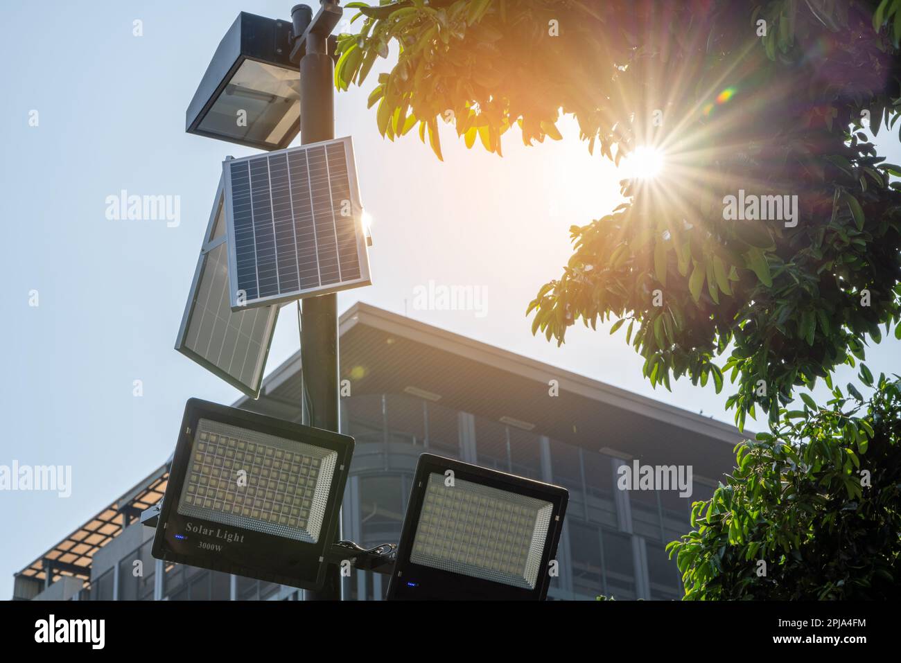 Solar Light. Public city light with solar panel powered on blue sky ...