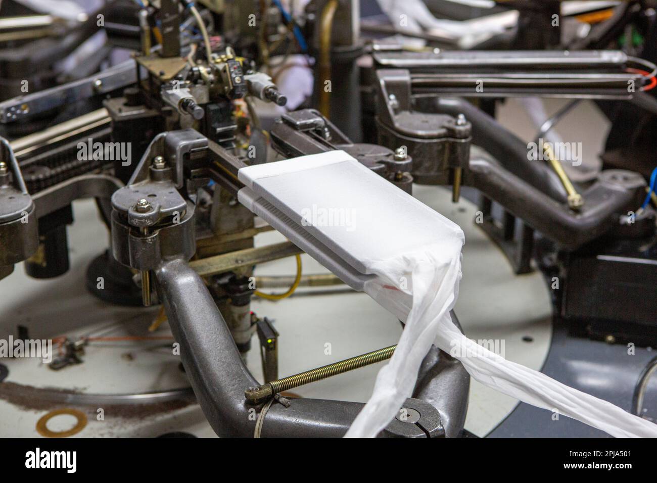 production of capron tights. Textile factory with machines and ...