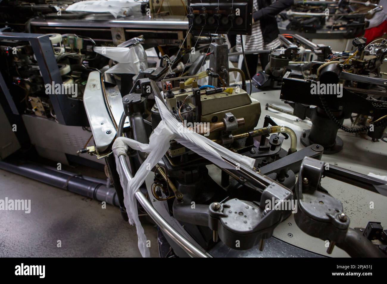 production of capron tights. Textile factory with machines and ...