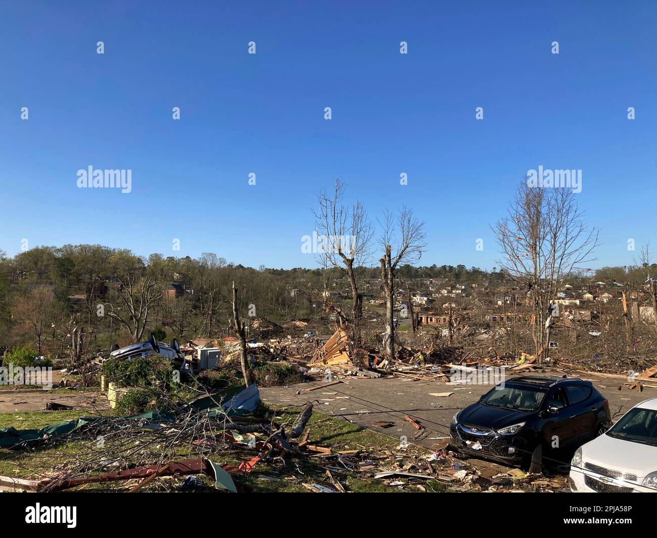 Homes are damaged in a neighborhood from a storm in Little Rock, Ark ...