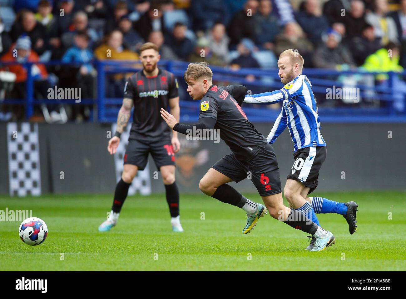 Barry Bannan #10 of Sheffield Wednesday and Max Sanders #6 of Lincoln ...