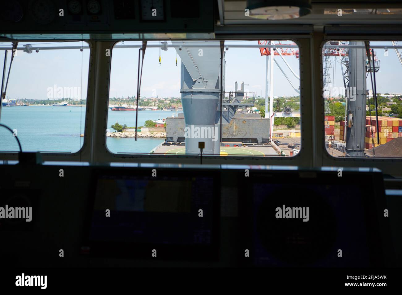 View from bulk carrier's captain's bridge to bulk cargo berth. View of ...
