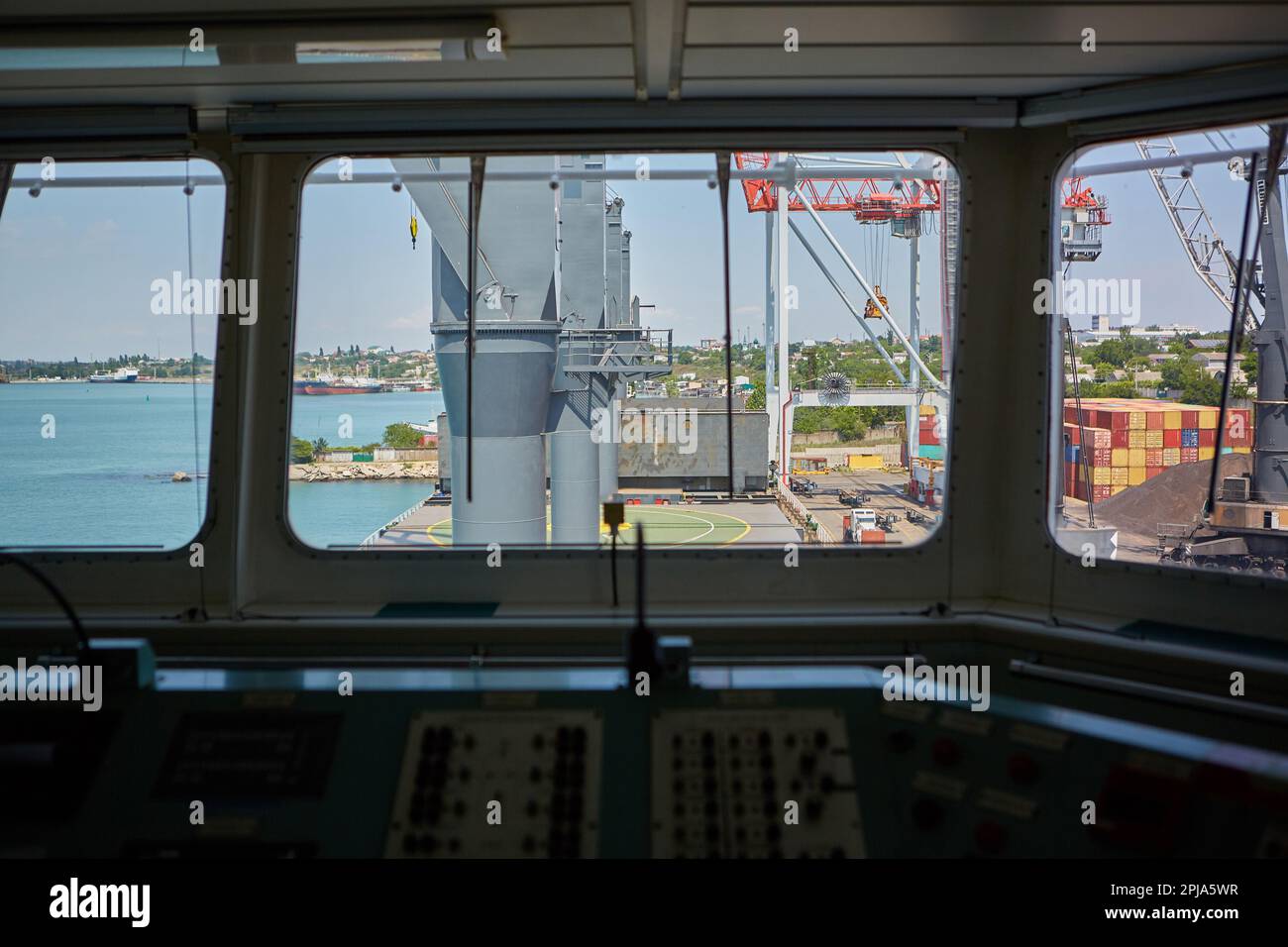 View from bulk carrier's captain's bridge to bulk cargo berth. View of ...