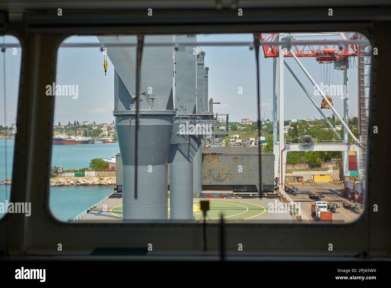 View from bulk carrier's captain's bridge to bulk cargo berth. View of ...