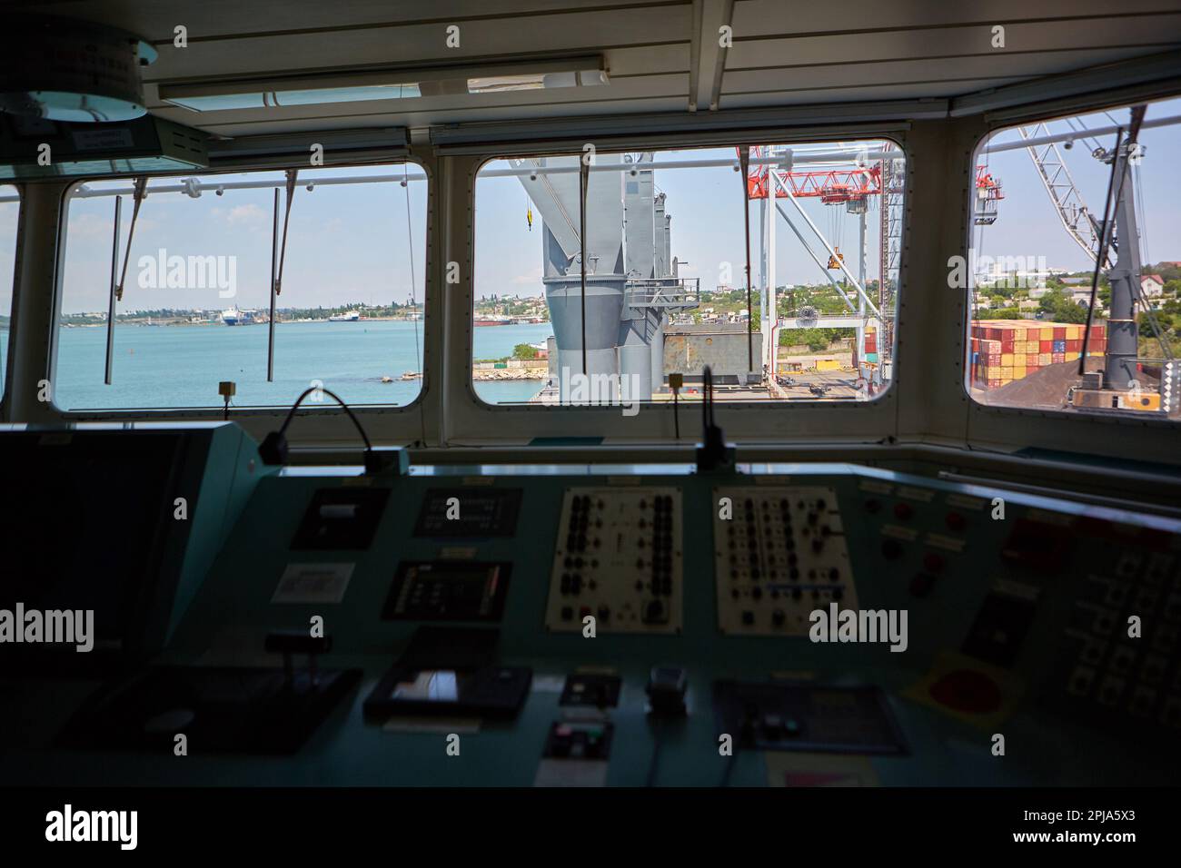 View from bulk carrier's captain's bridge to bulk cargo berth. View of ...