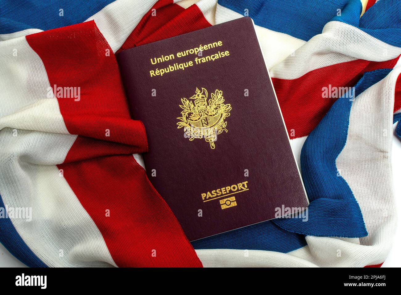 French passport on a tricolor fabric background Stock Photo - Alamy