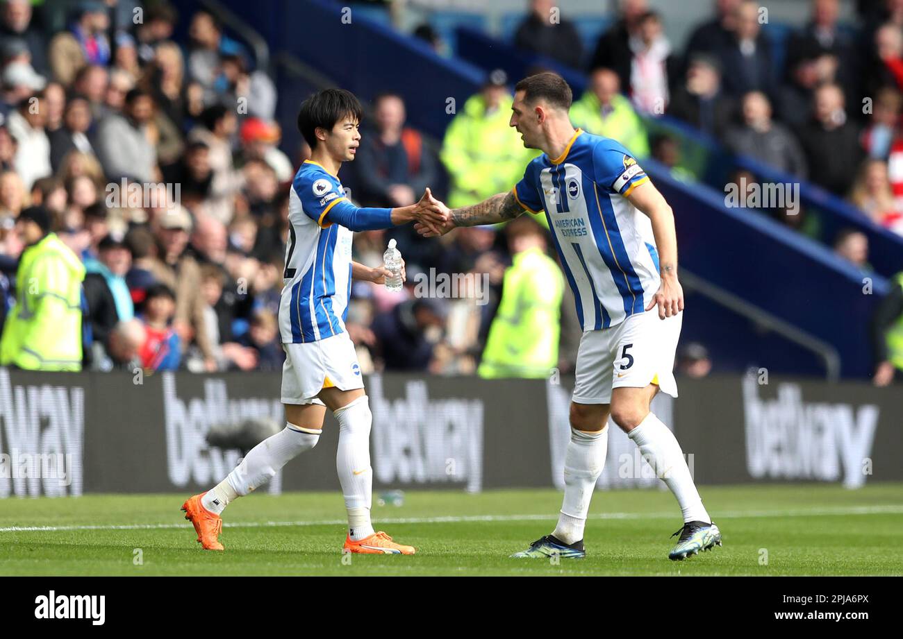 Brighton and Hove Albion's Kaoru Mitoma (left) celebrates scoring their ...
