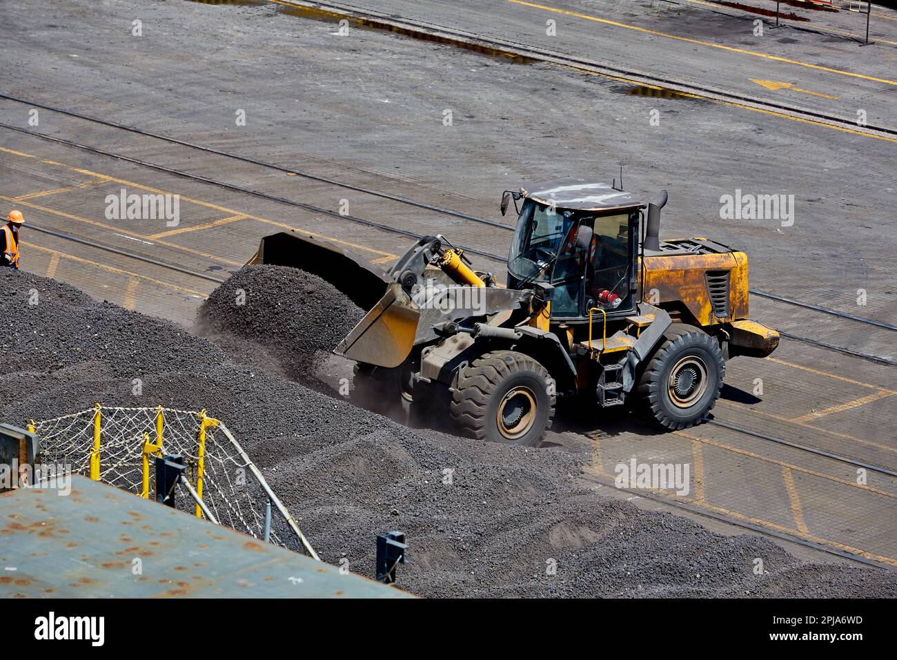 Operations with coal in seaport. Loading coal on bulk carrier. Coal ...