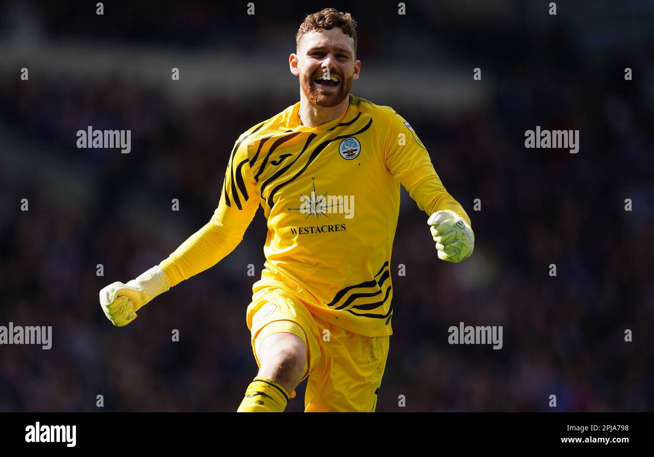 Swansea City goalkeeper Andy Fisher celebrates after team-mate Liam ...