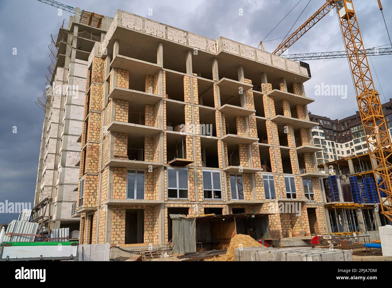 Construction site. High rise Building under construction. Construction ...