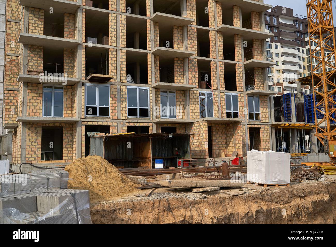 Construction site. High rise Building under construction. Construction ...