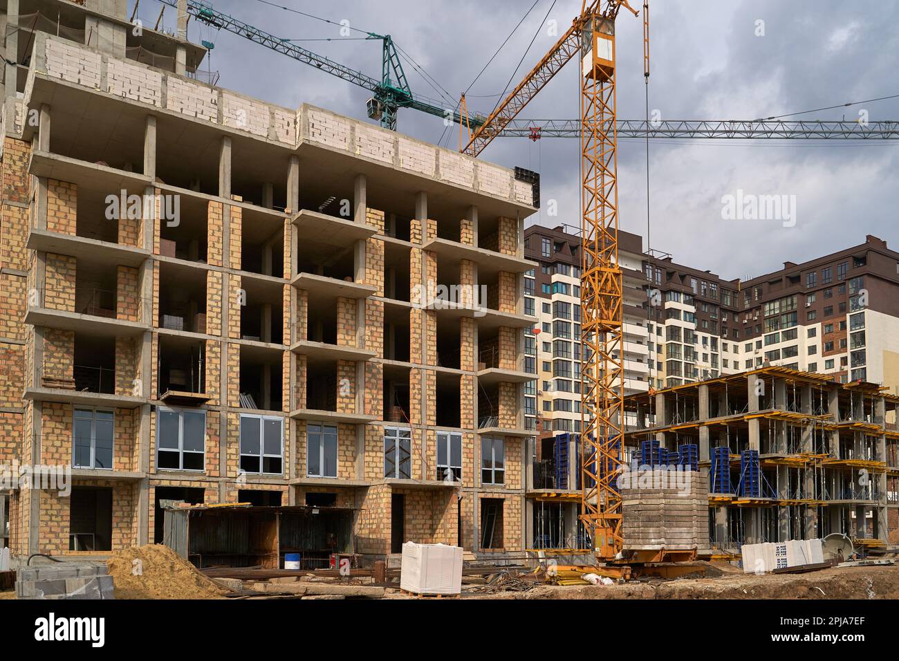 Construction site. High rise Building under construction. Construction ...