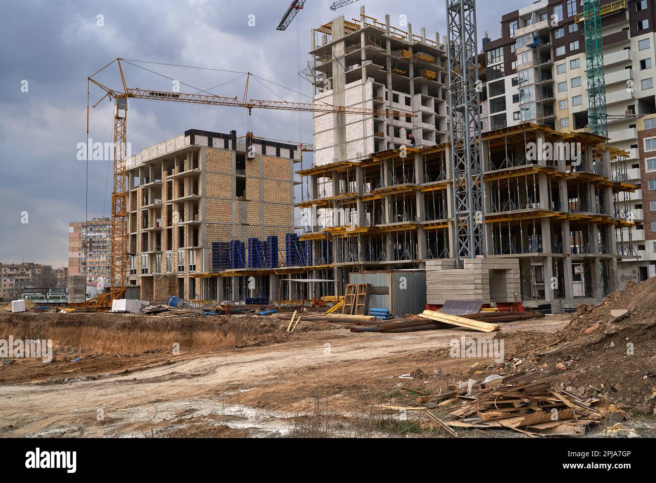 Construction site. High rise Building under construction. Construction ...