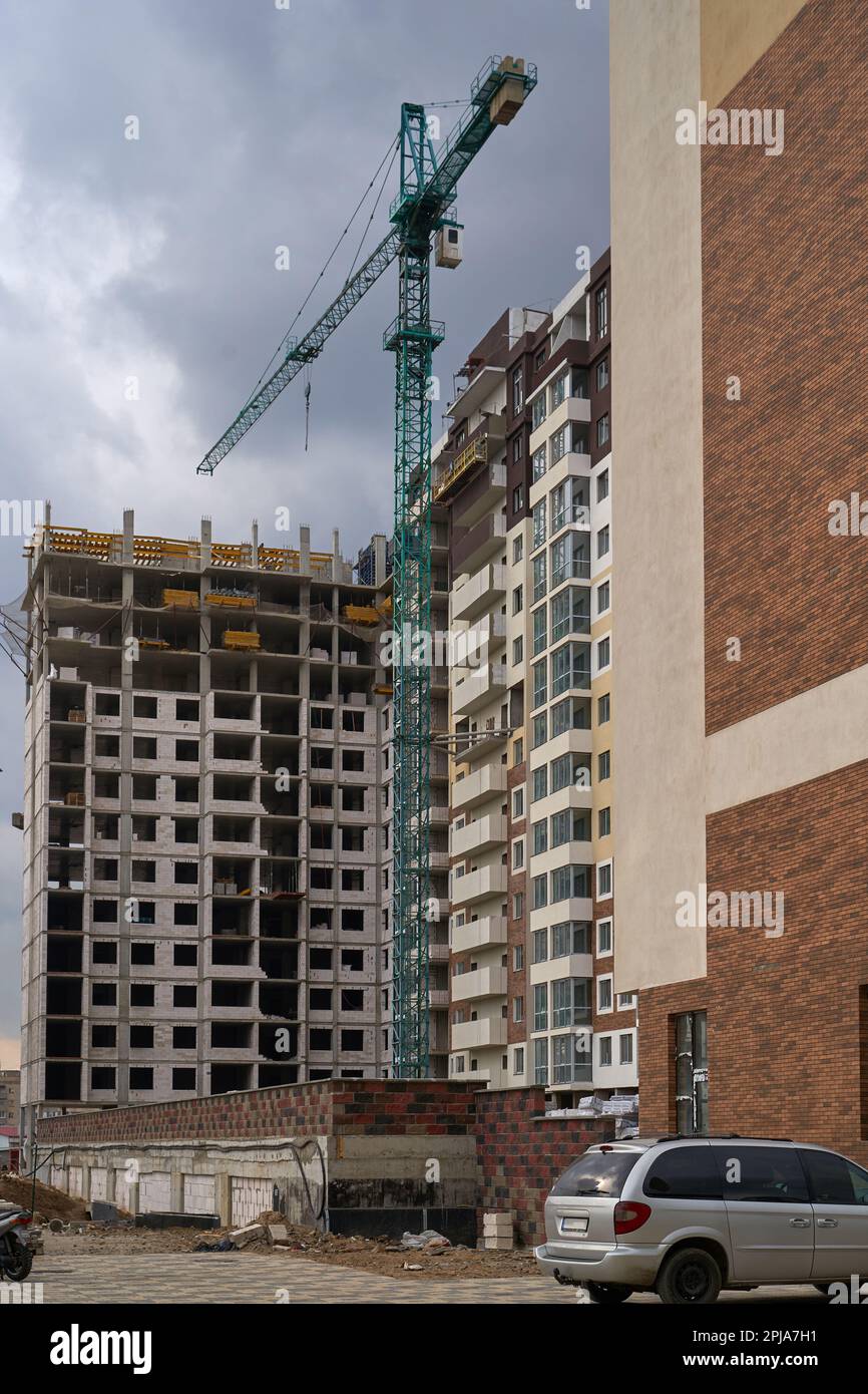 Construction site. High rise Building under construction. Construction ...