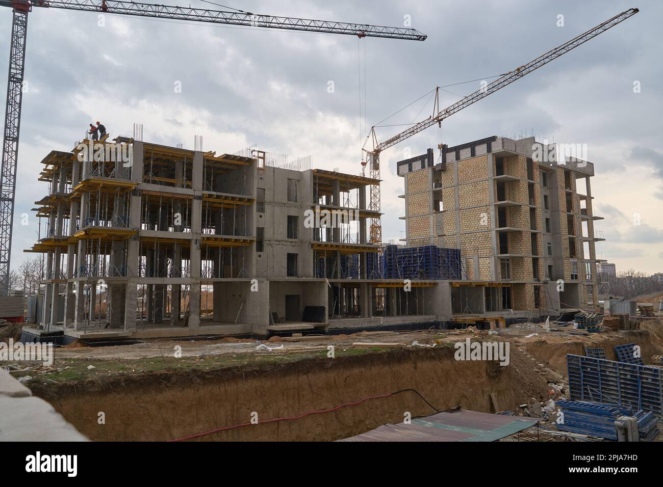 Construction site. High rise Building under construction. Construction ...