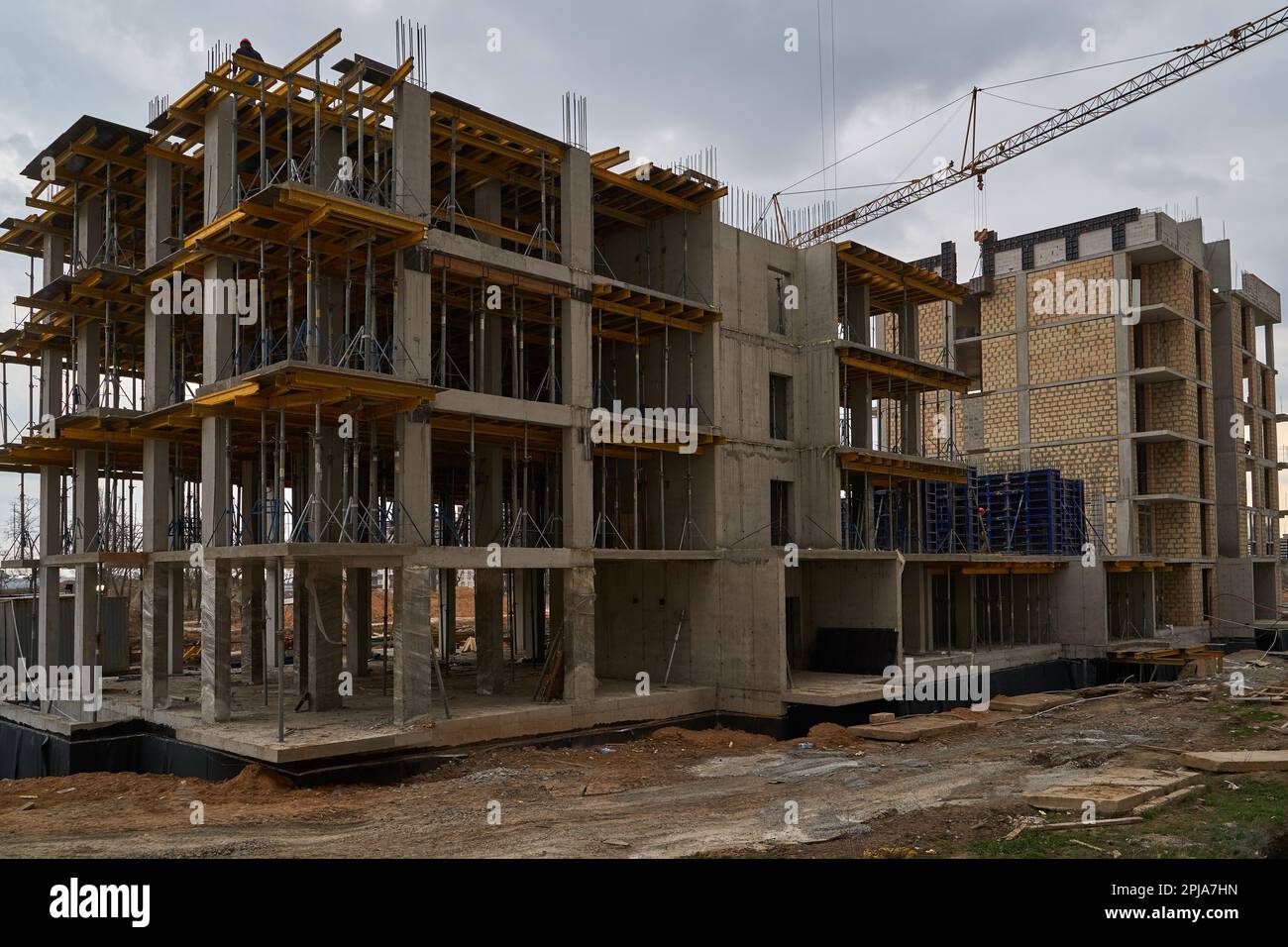 Construction site. High rise Building under construction. Construction ...