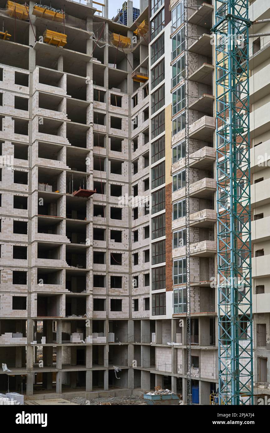 Construction site. High rise Building under construction. Construction ...