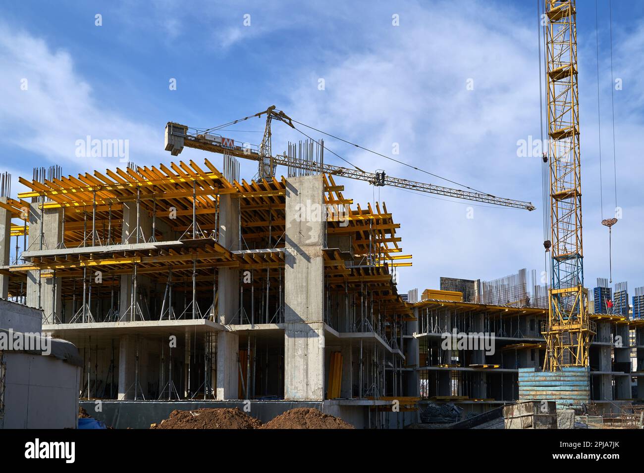 Construction site. High rise Building under construction. Construction ...