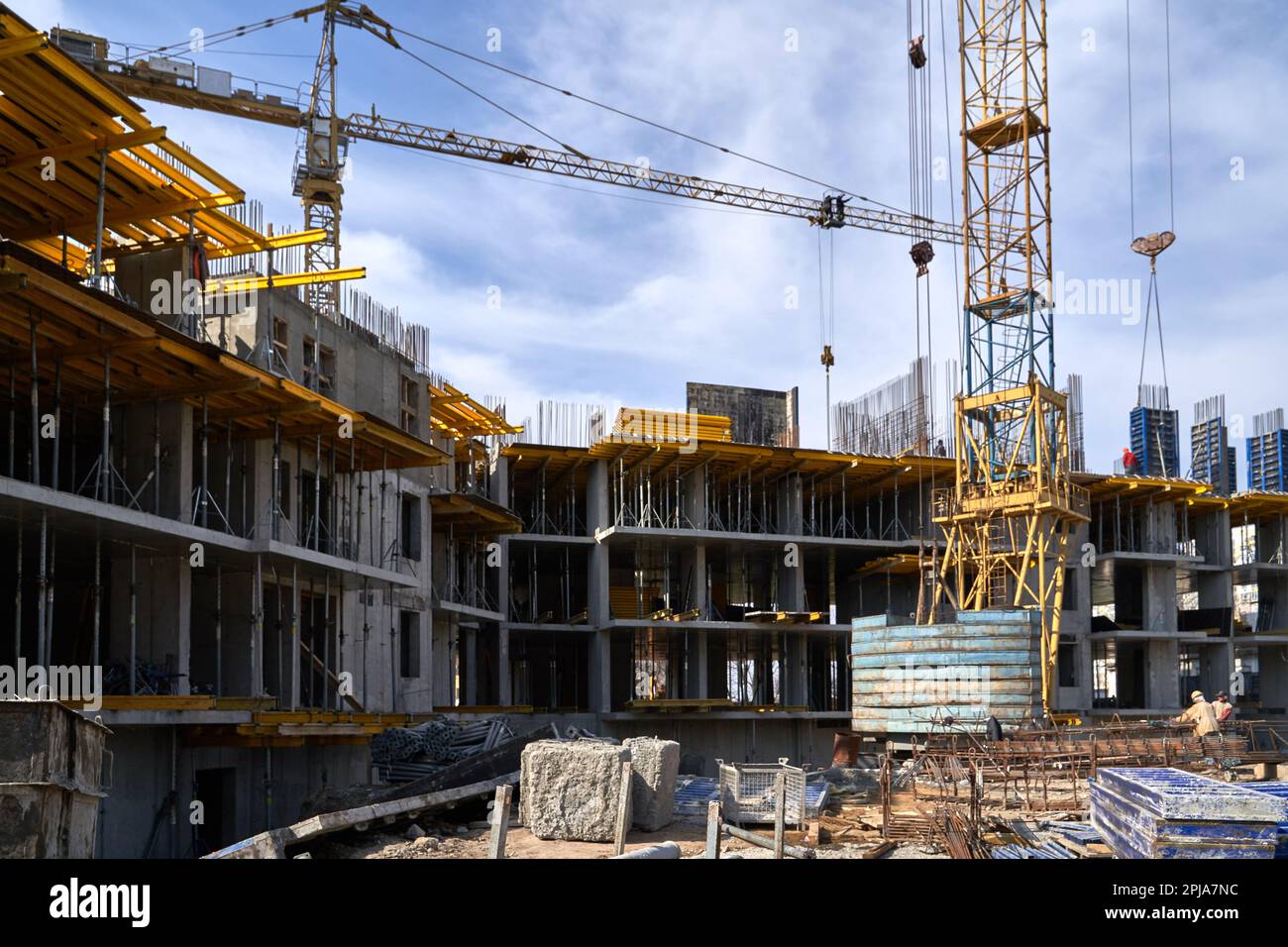 Construction site. High rise Building under construction. Construction ...