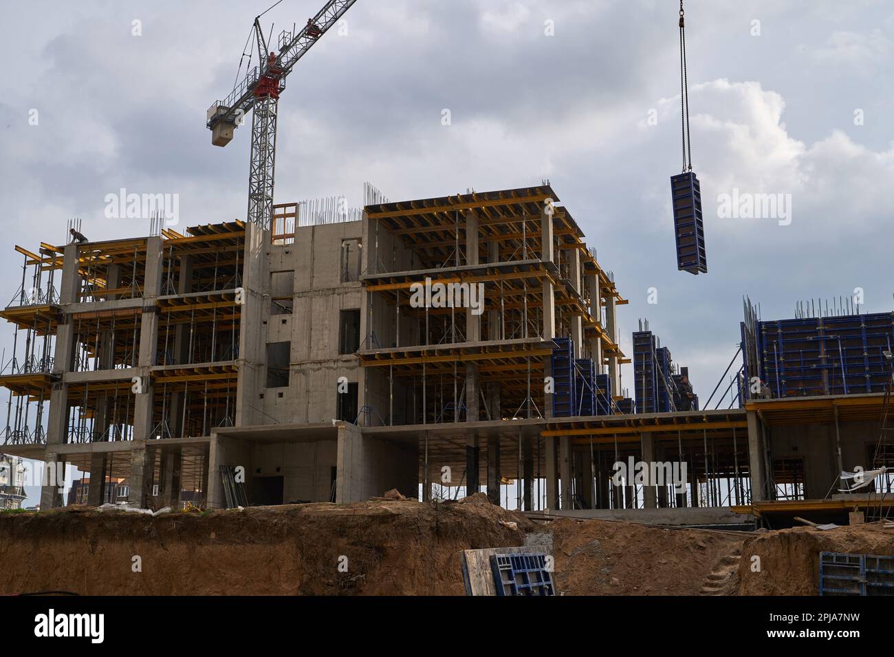 Construction site. High rise Building under construction. Construction ...