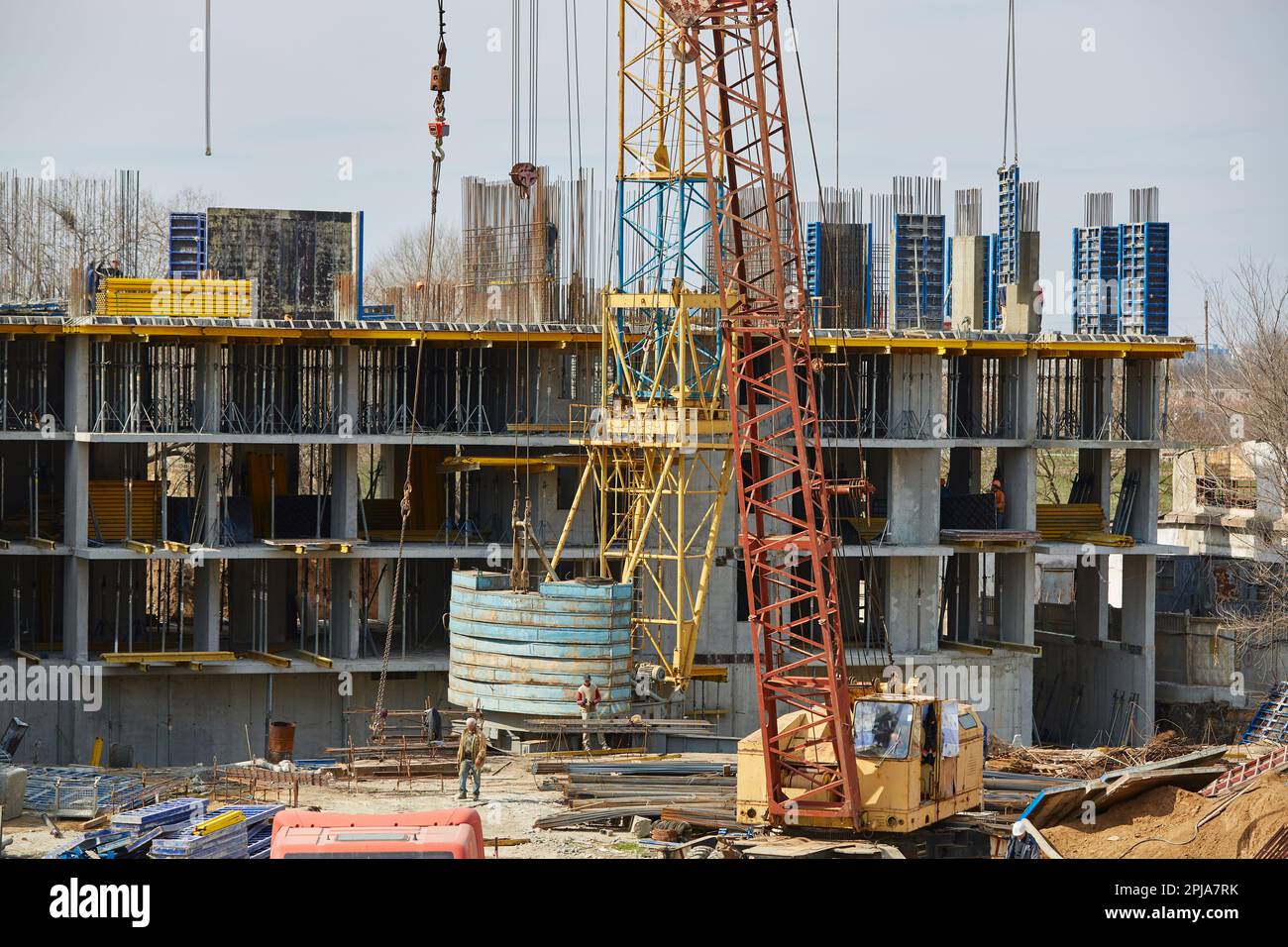 Construction site. High rise Building under construction. Construction ...
