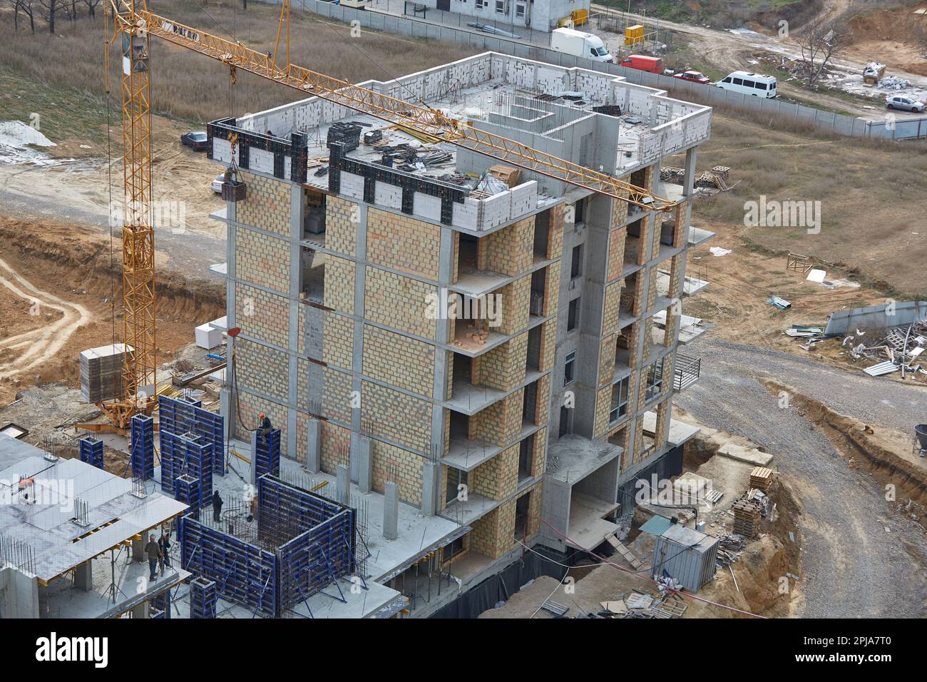Construction site. High rise Building under construction. Construction ...