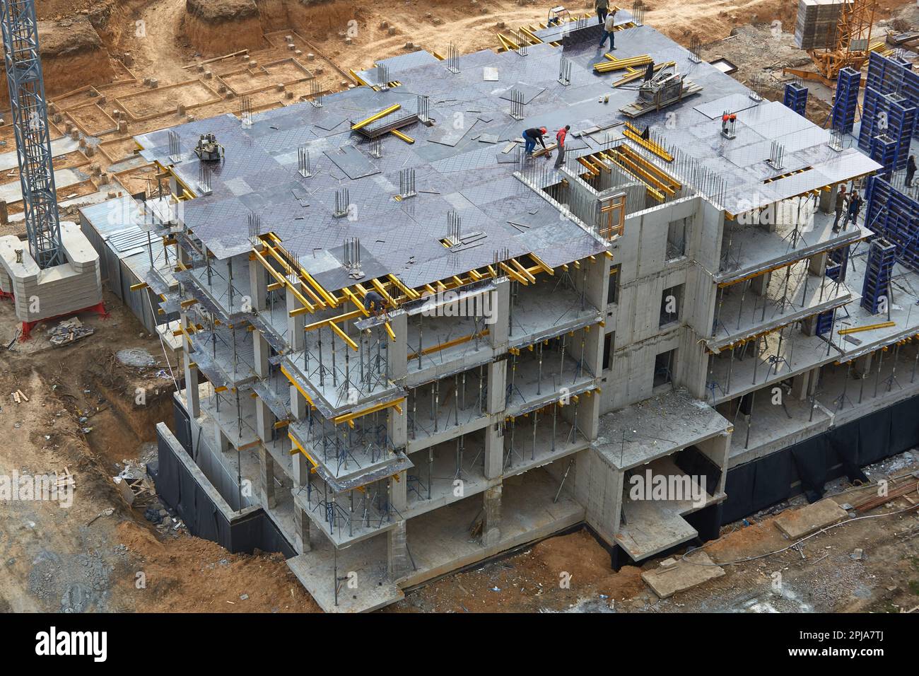 Construction site. High rise Building under construction. Construction ...